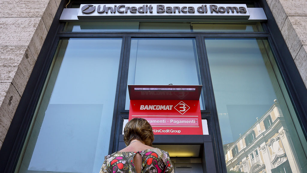 Italy’s credit rating downgraded in debt crisis – Channel 4 News