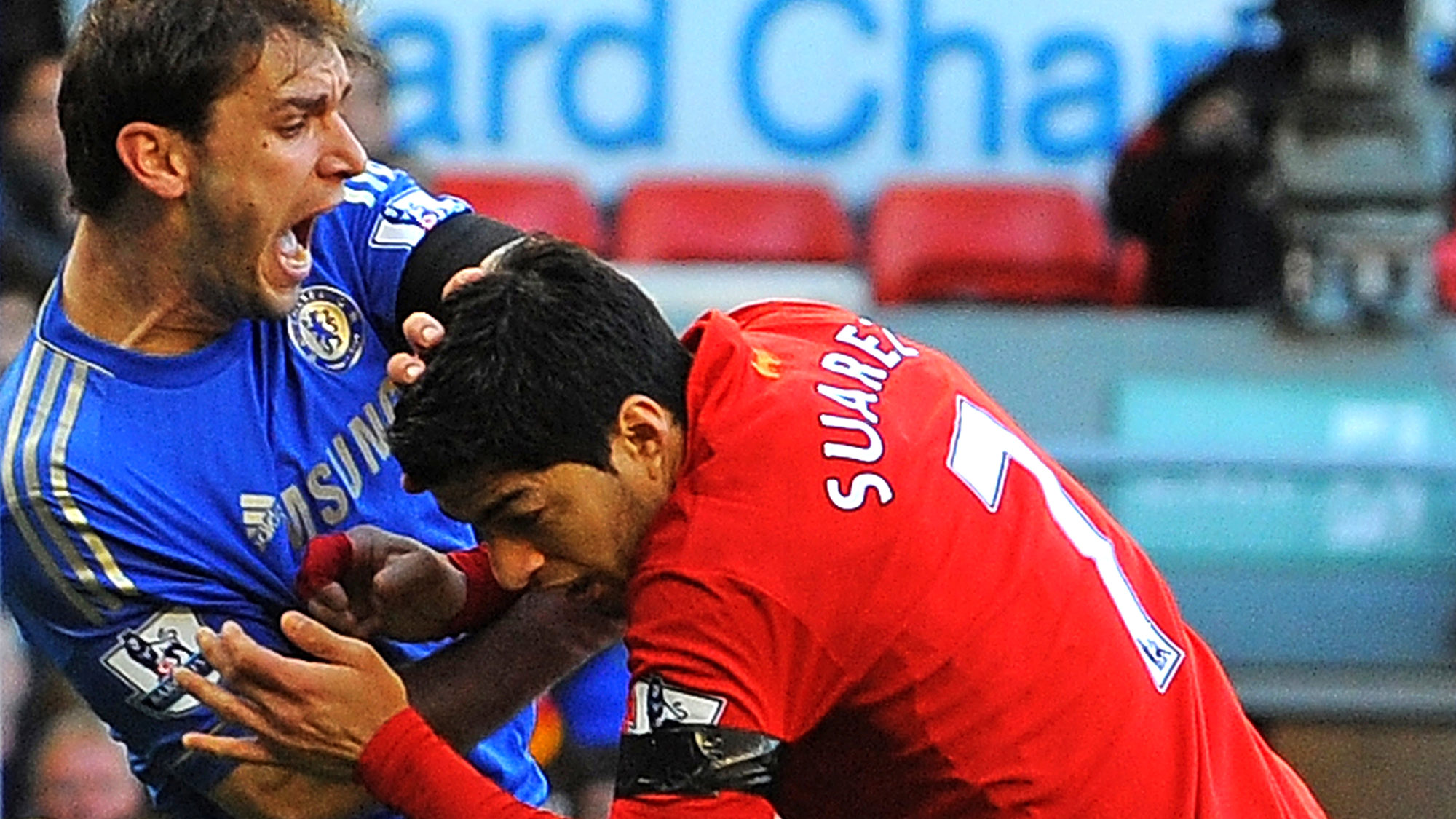 Luis Suarez charged with violent conduct for biting player – Channel 4 News