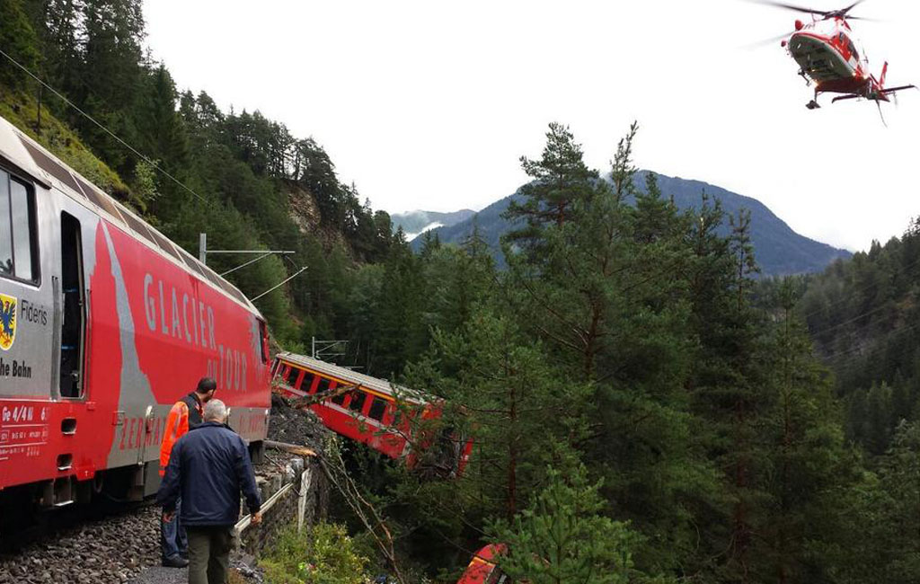 Swiss train crash leaves carriages dangling over ravine – Channel 4 News