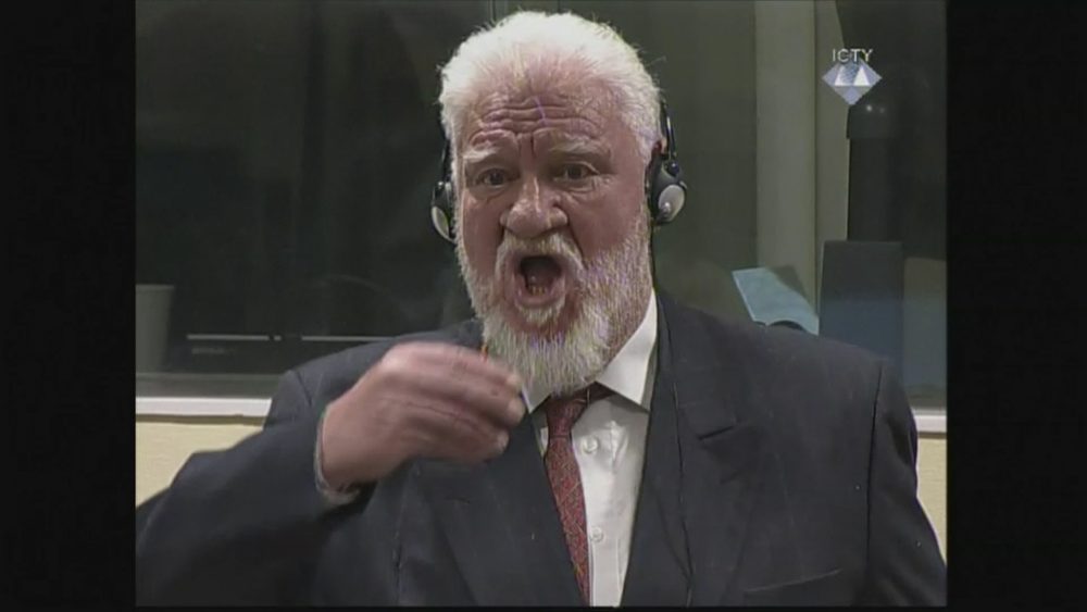 Bosnian Croat war criminal dies after swallowing ‘poison’ – Channel 4 News