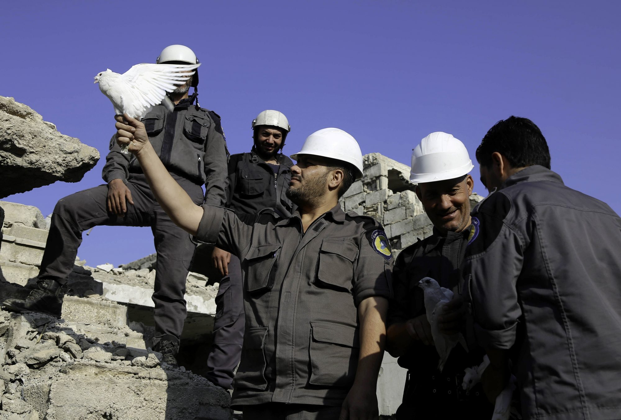 Hundreds of White Helmet volunteers evacuated from Syria – Channel 4 News