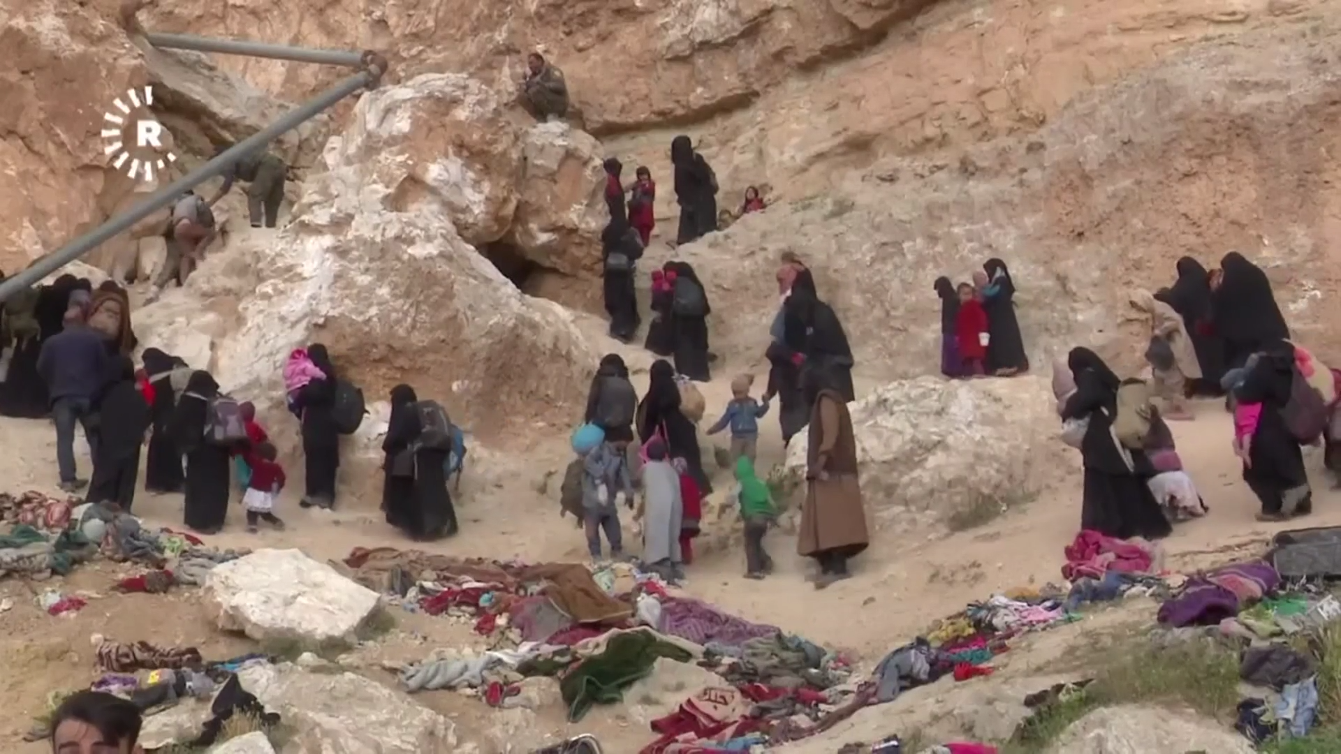 Isis families and fighters flee last battleground of caliphate ...