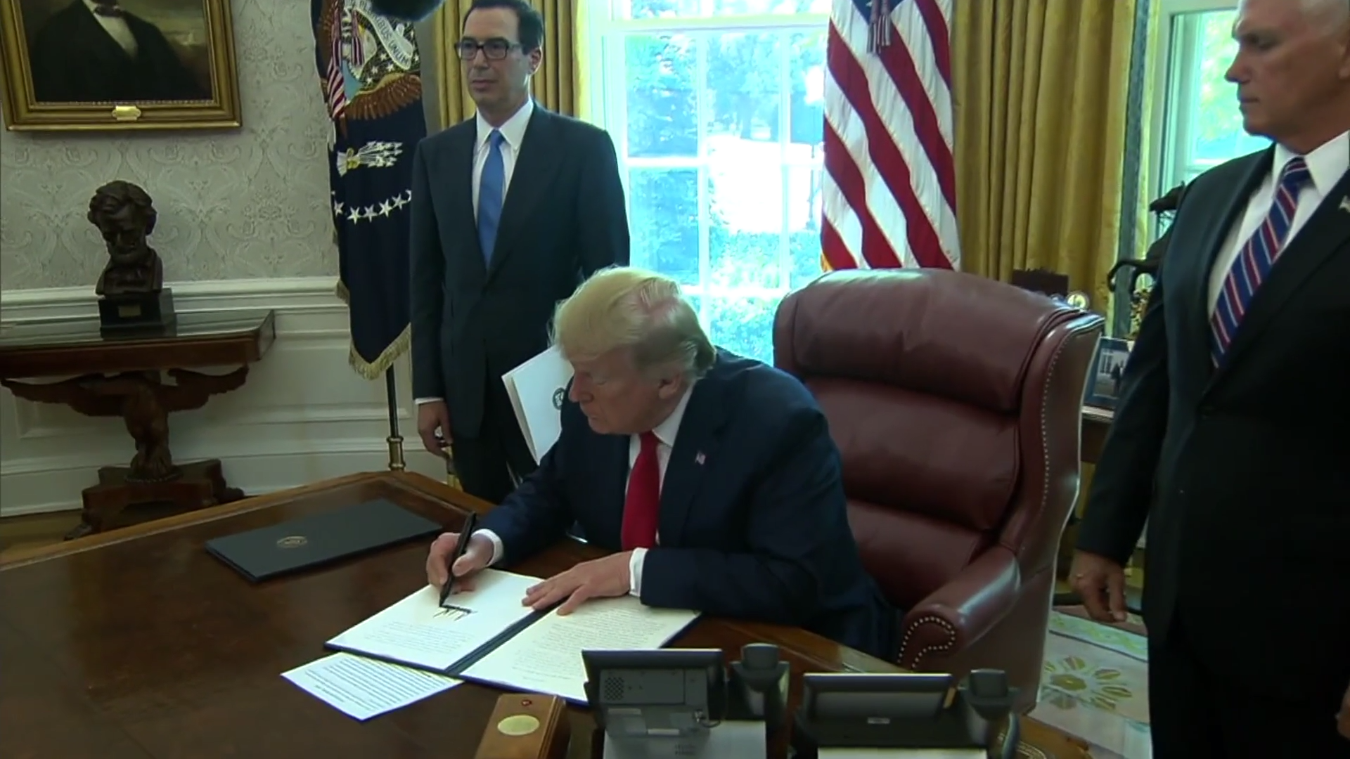 Trump signs new sanctions against Iran – Channel 4 News