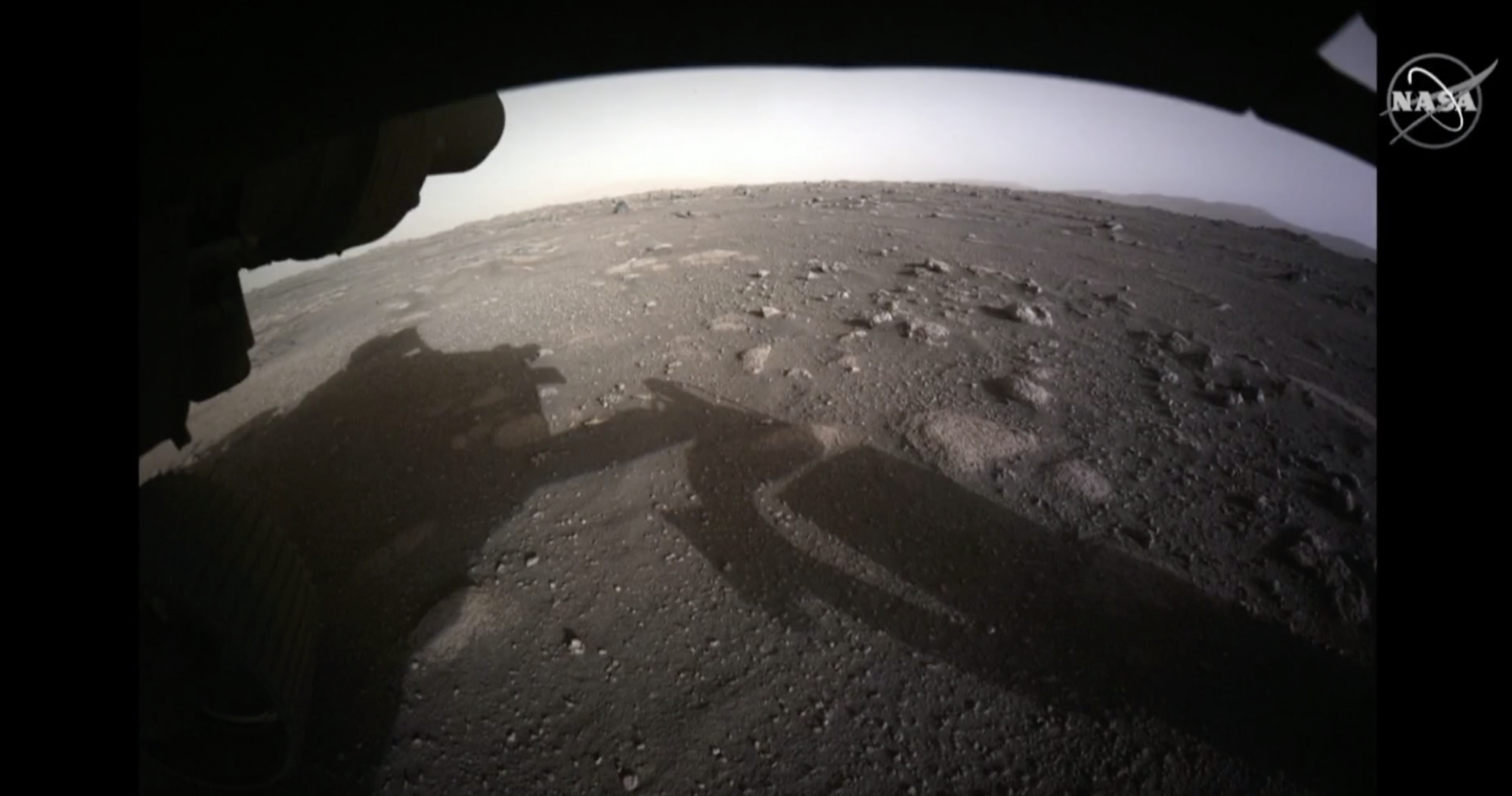 Nasa Perseverance rover sends back first images of Mars as it begins ...