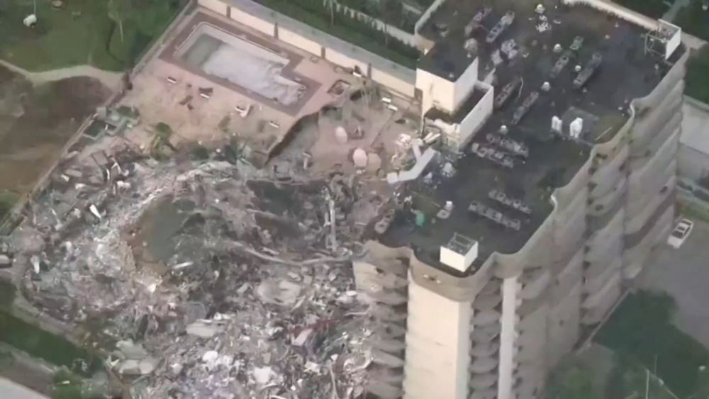 Miami building collapse: at least four dead and dozens missing ...